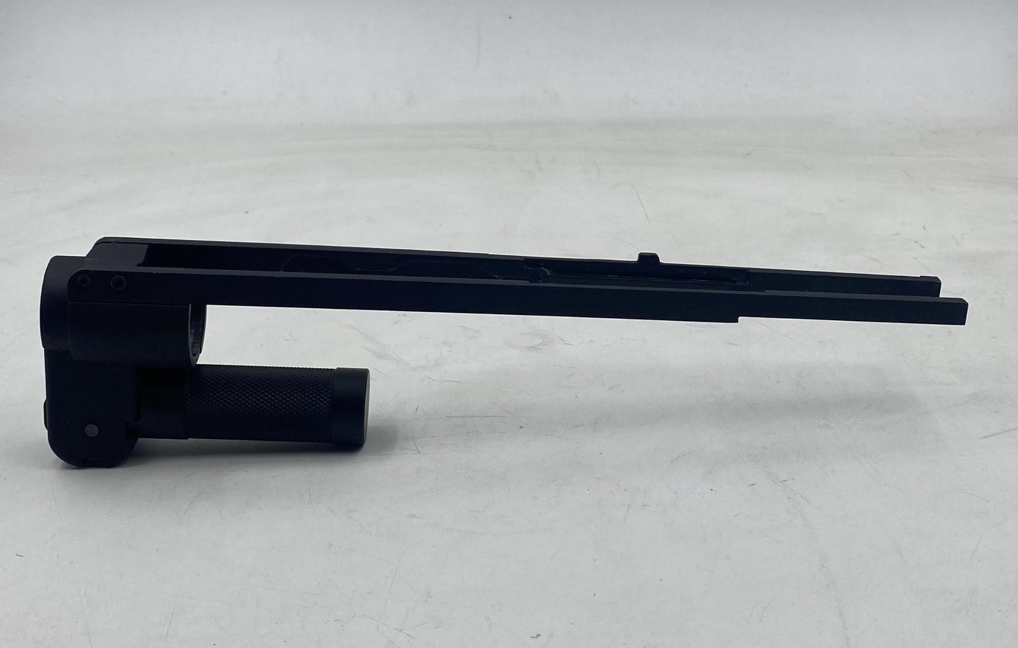 FOLDING PUMP GRIP FOR CQB SHOTGUN — JAG Precision Inc